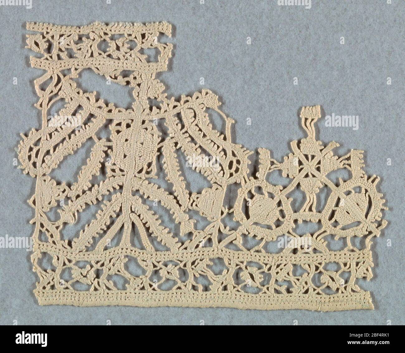 Fragment. Wide insertion of reticella that is divided into squares ...