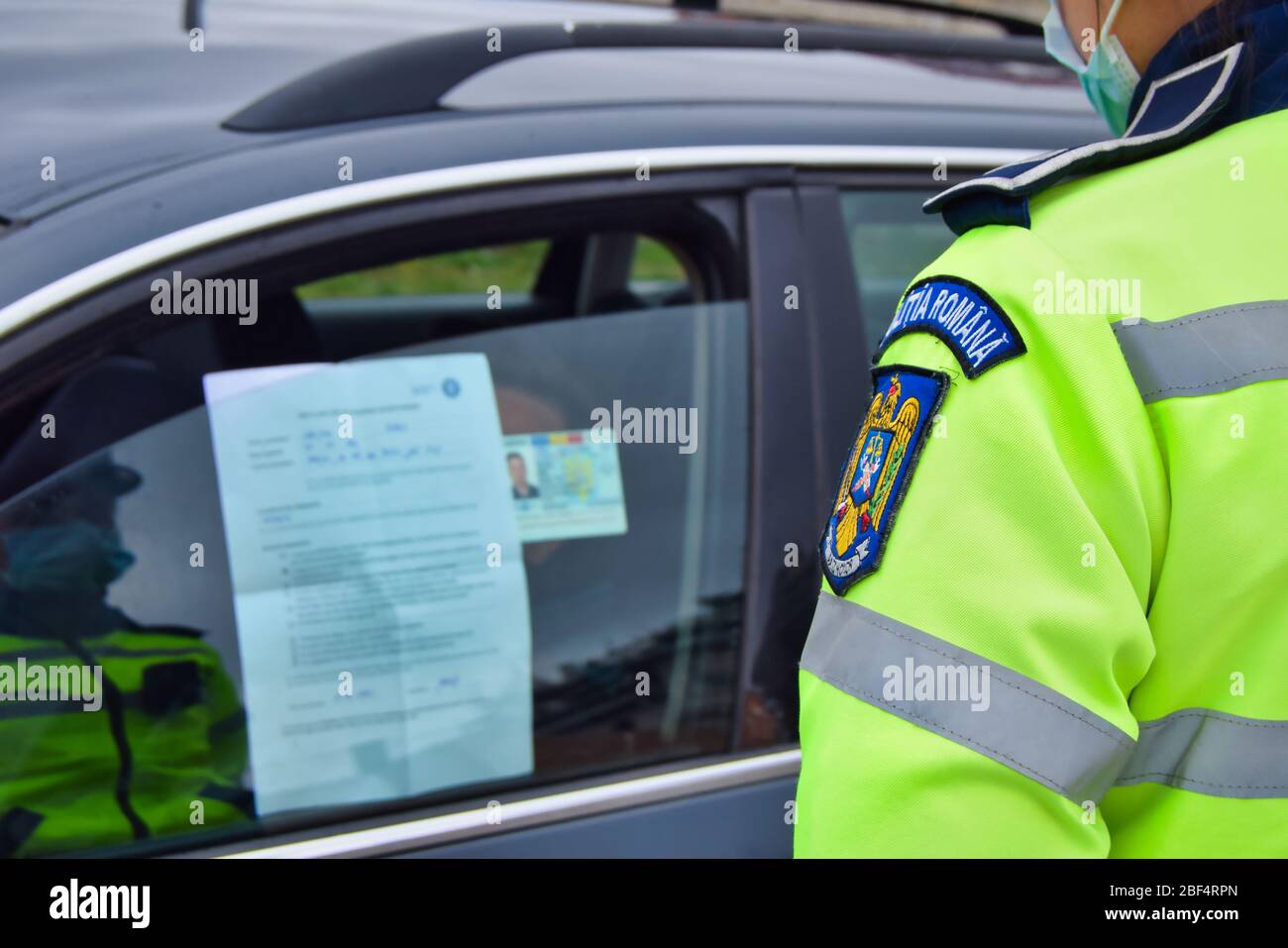 Police agent, Romanian Traffic Police (Politia Rutiera) with surgical ...