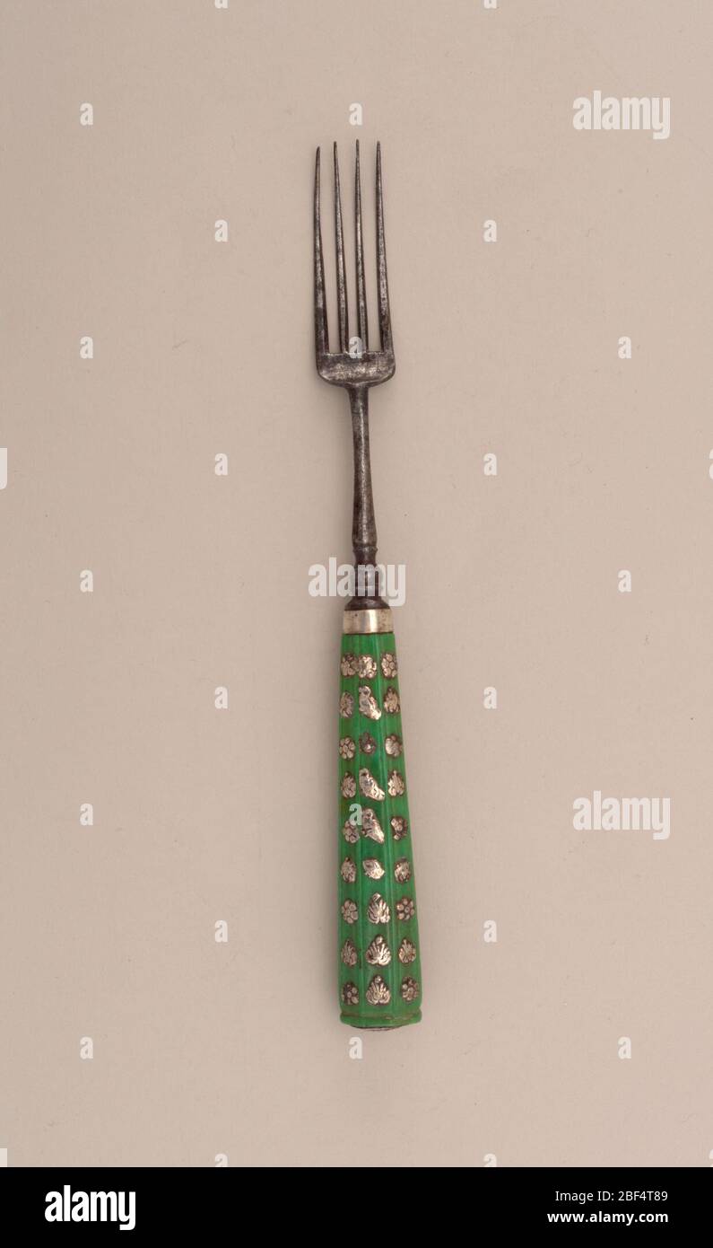 Fork. Four curved tines, curved shoulders and long baluster neck, Plain ...