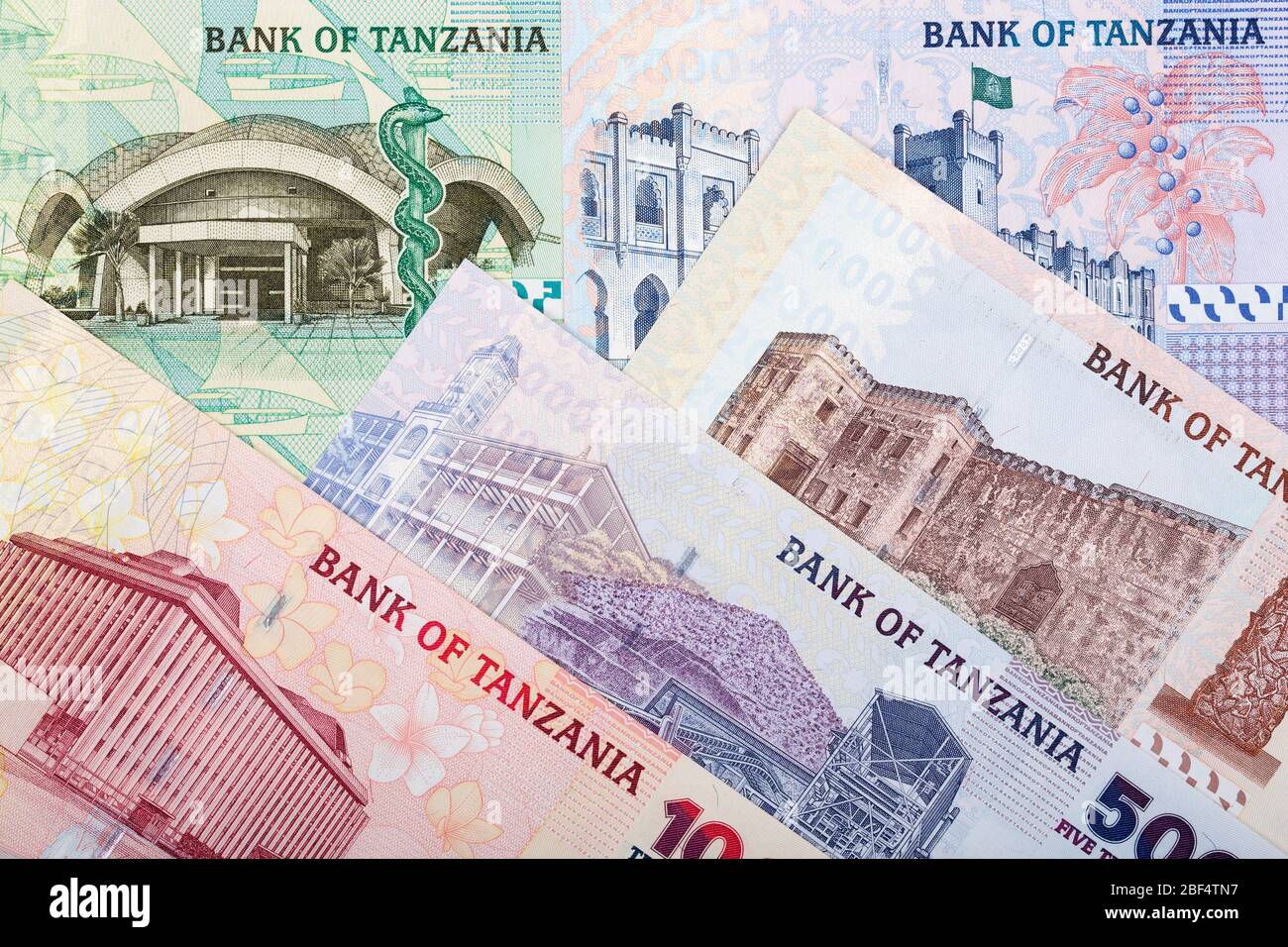 Old Tanzanian money - shilling a business background Stock Photo - Alamy