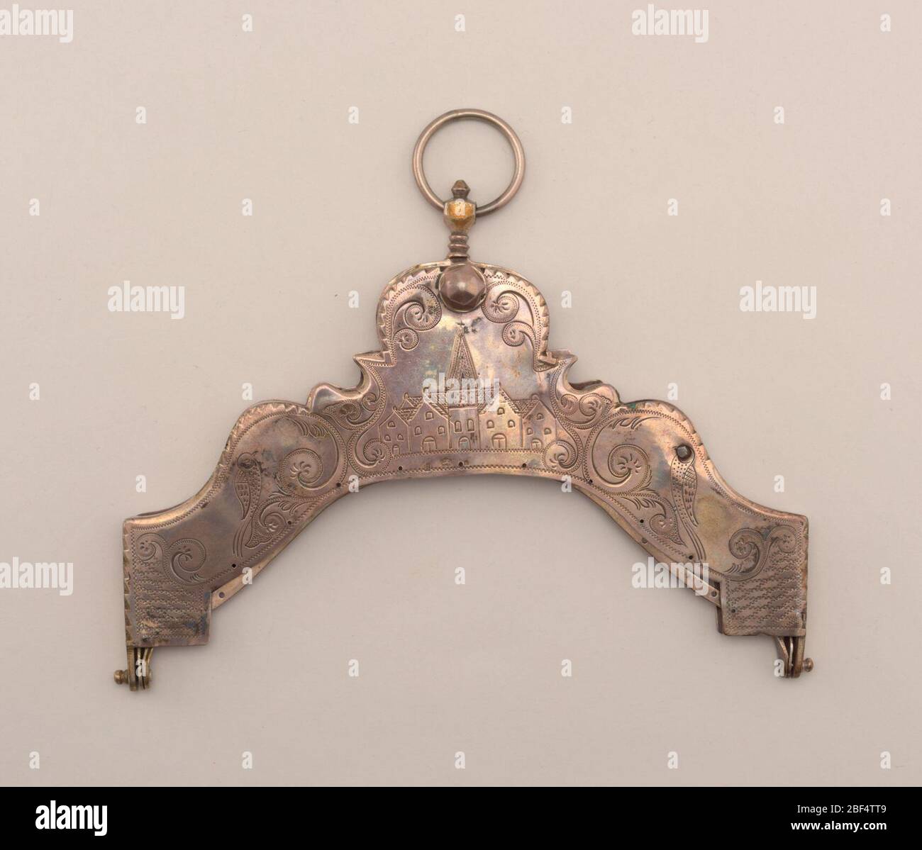 Purse handle. Shaped purse frame and inner frame pivoting on two pins ...