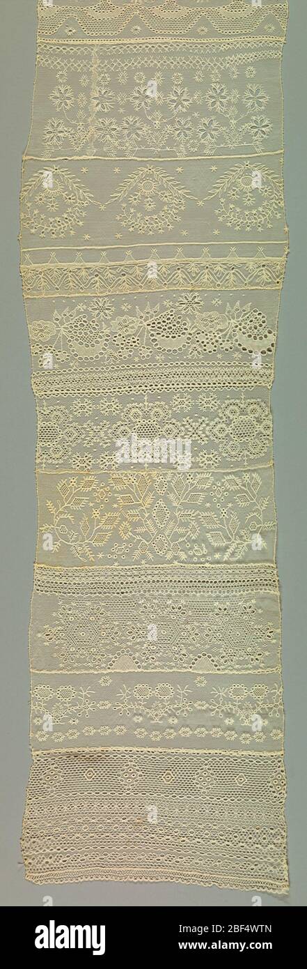 Sampler. Twelve designs worked as cross border; edged at top and bottom ...