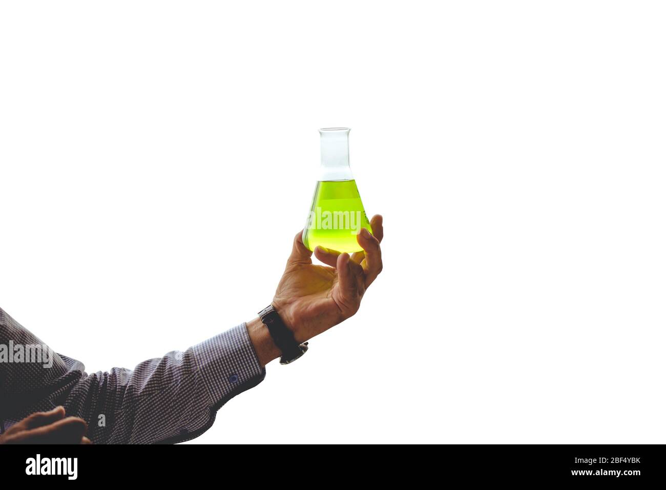 scientist hand holding chemical liquid in scientific glassware in ...