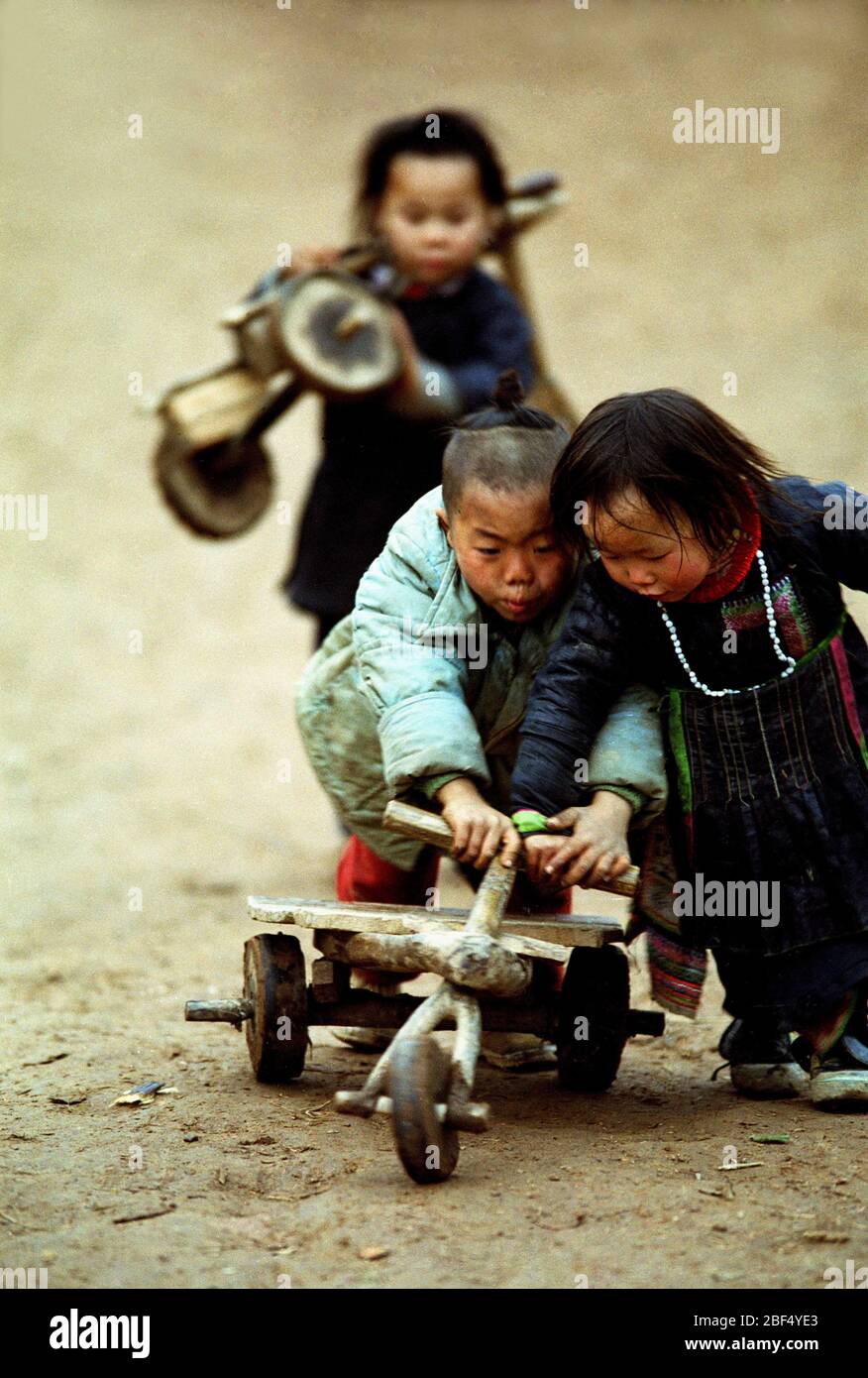 Child with a wheelbarrow child with a wheelbarrow hi-res stock ...