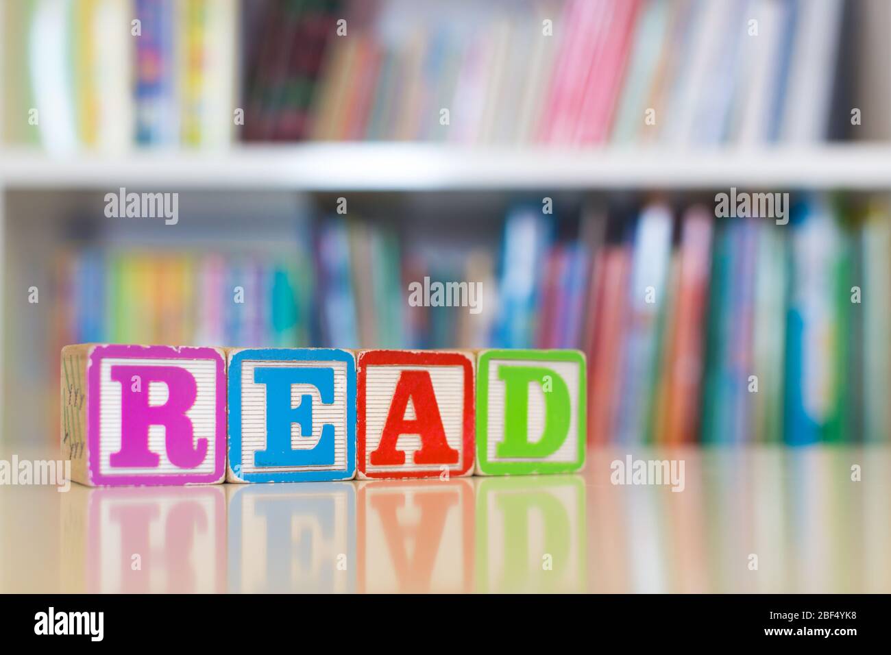 The word 'read' spelled on learning blocks in a classroom library ...