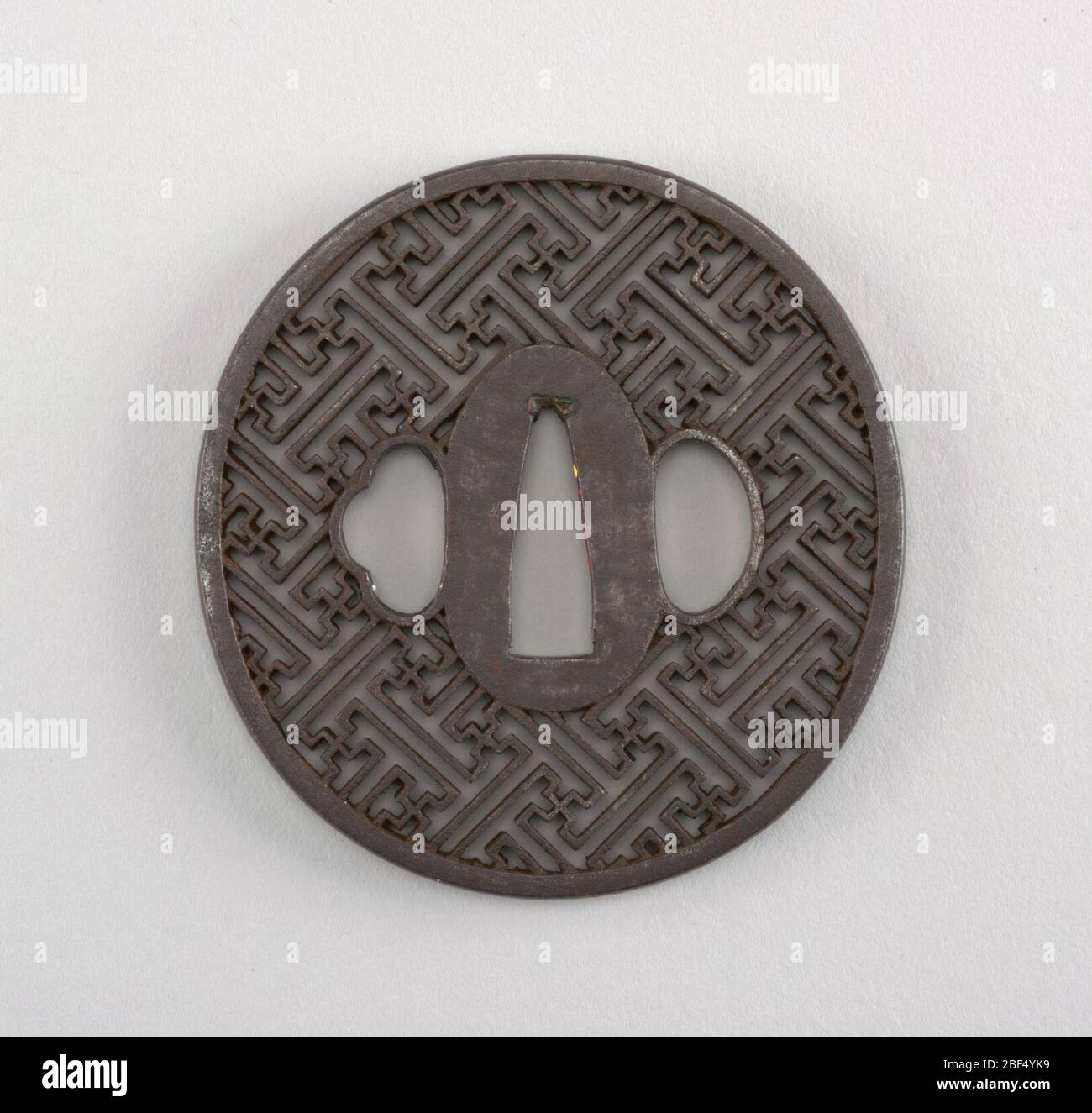 Tsuba. Manji tsunagi: a conventional link pattern or diaper of "Manji ...