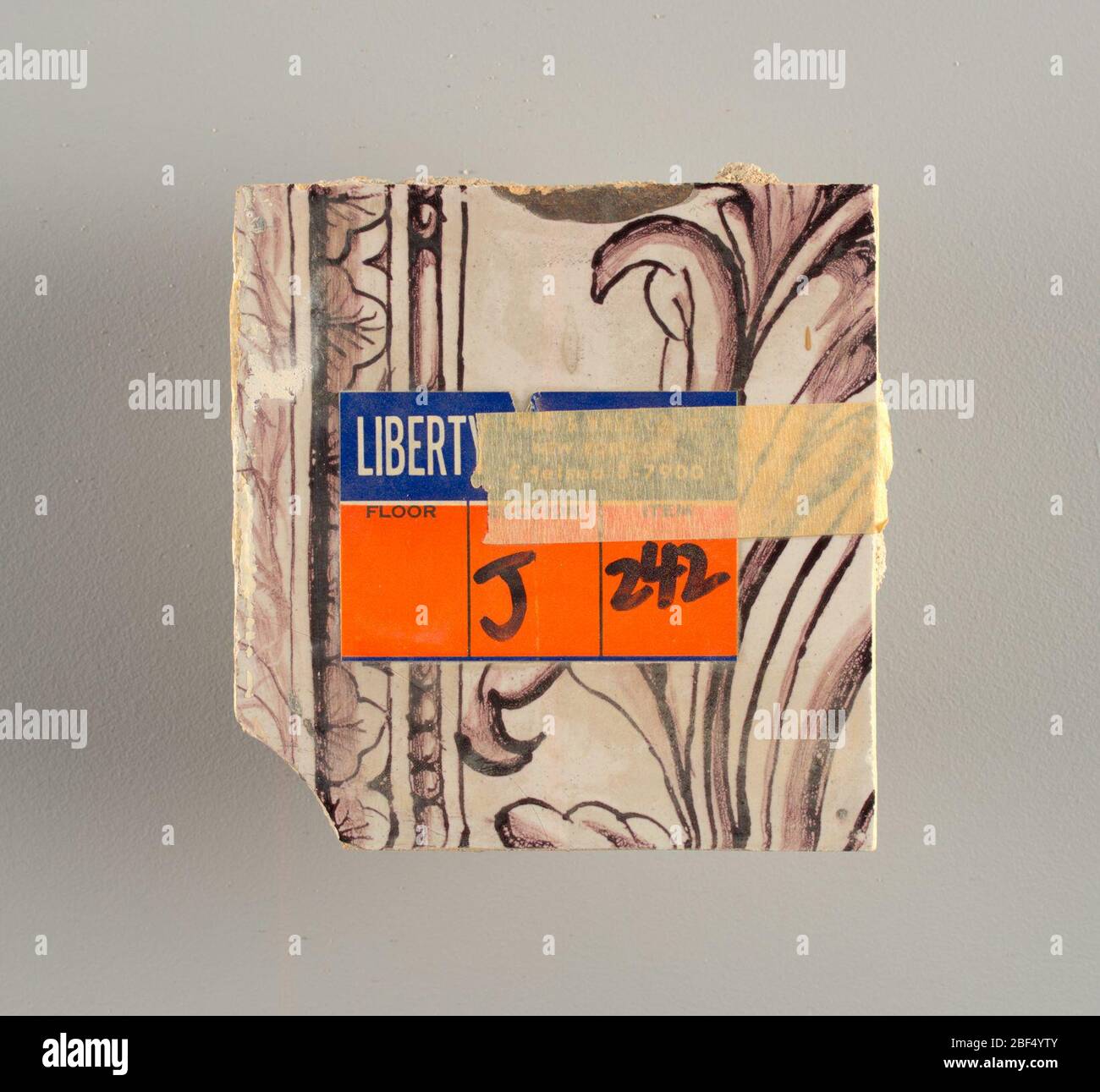 Wall facing. Two vertical rectangles, twenty-three tiles high. A) Nine ...