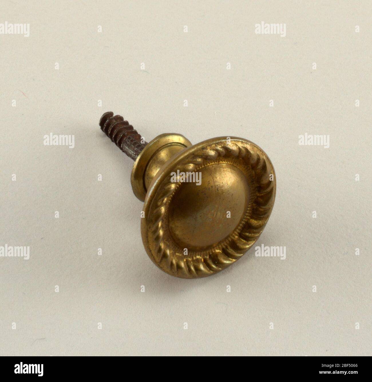 Knob. Repousse head with simple mouldings. Threaded bolt on back Stock ...