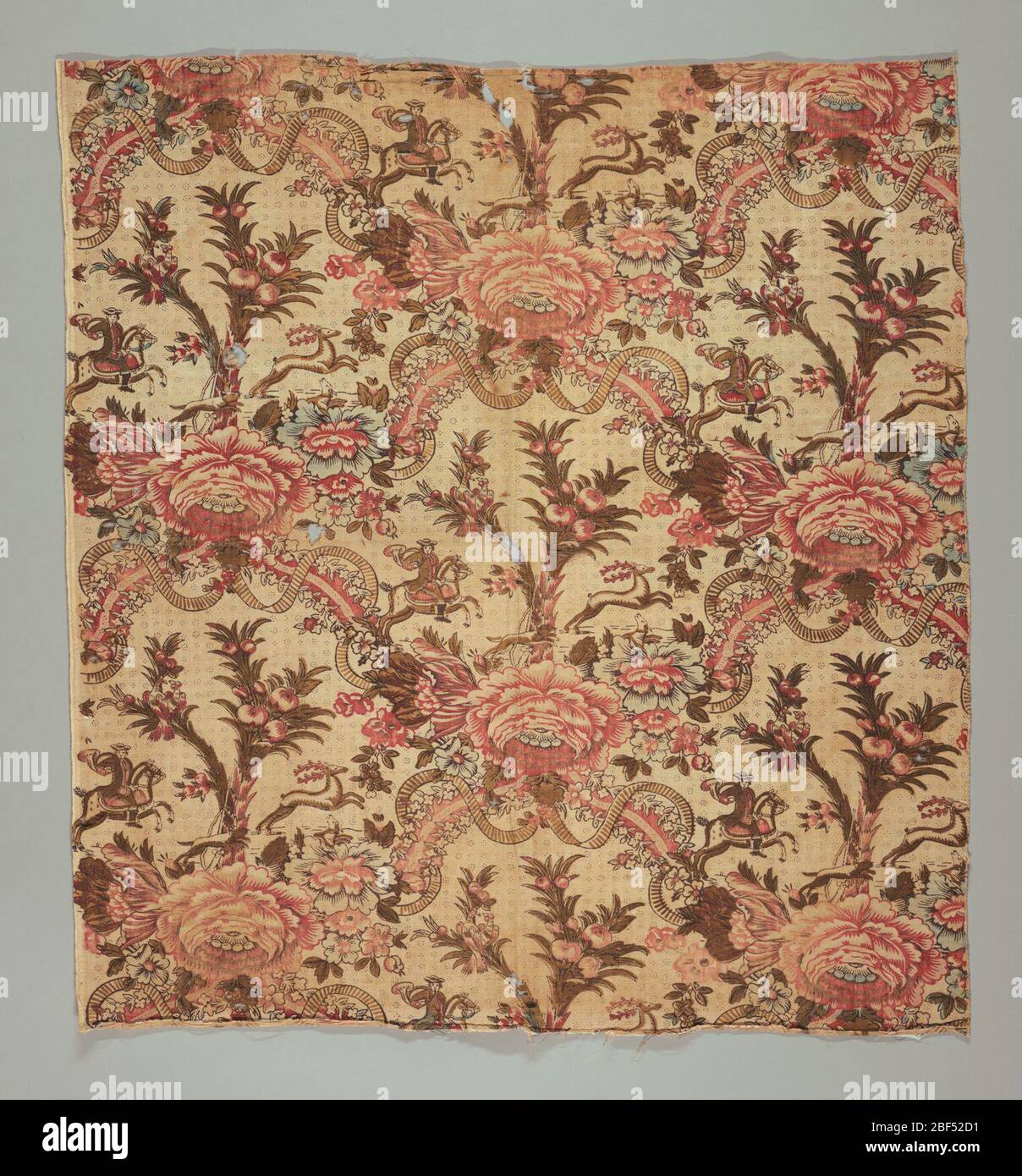 Textile. Polychrome design of a rider blowing a french horn following a ...