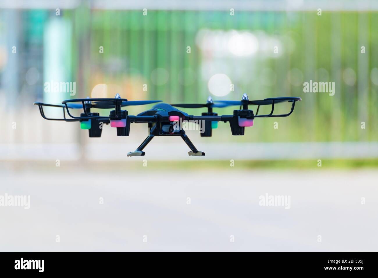 Flying drone of quad copter in the air. spy concept Stock Photo - Alamy