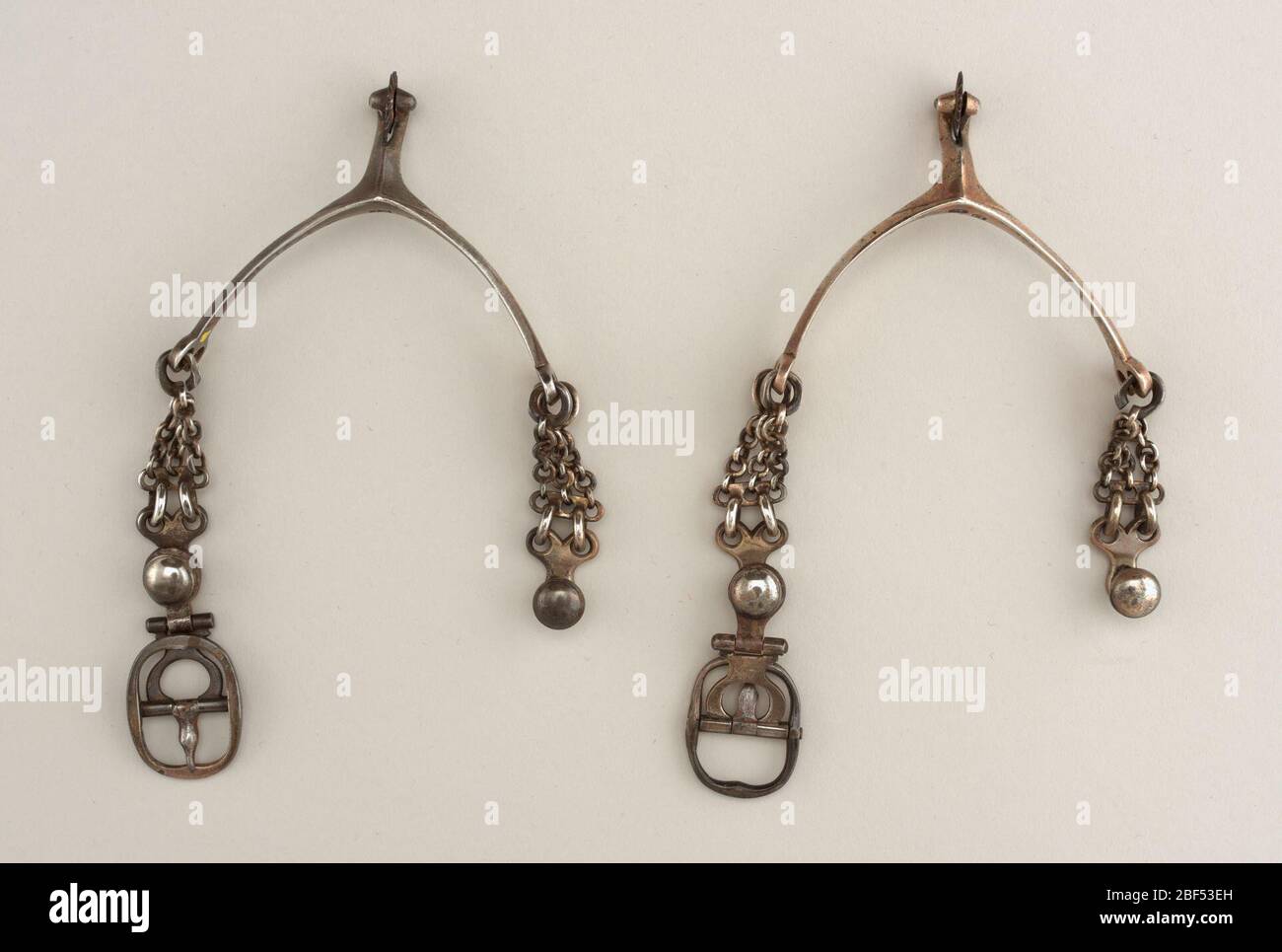 Pair of womens silver spurs. Pair of silver spurs for a woman; curved ...