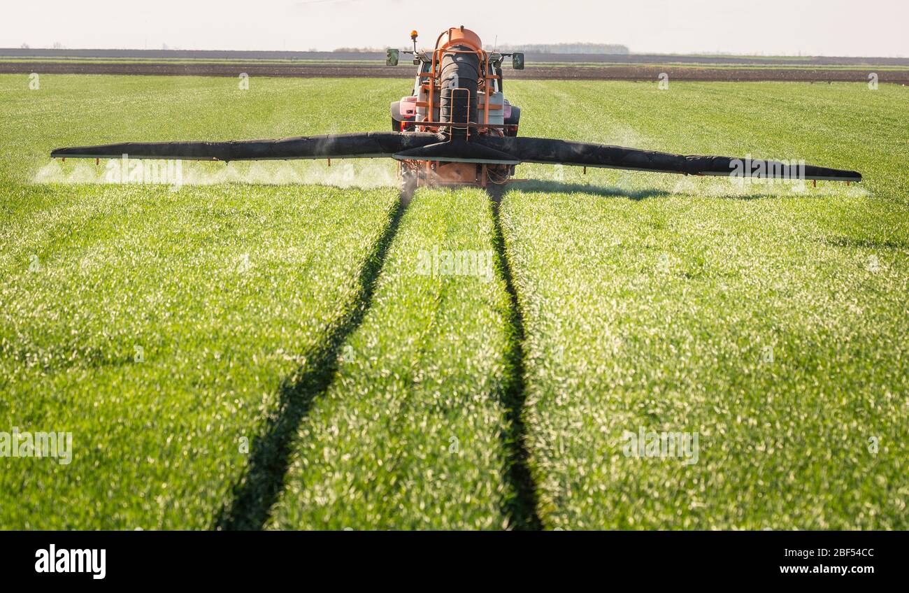 Tractor spraying soil hi-res stock photography and images - Alamy