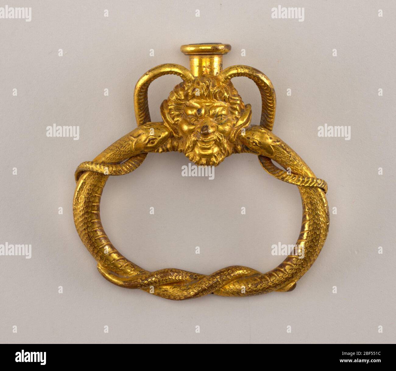 Handle. Horizontal loop form composed of two snakes with tails entwined ...