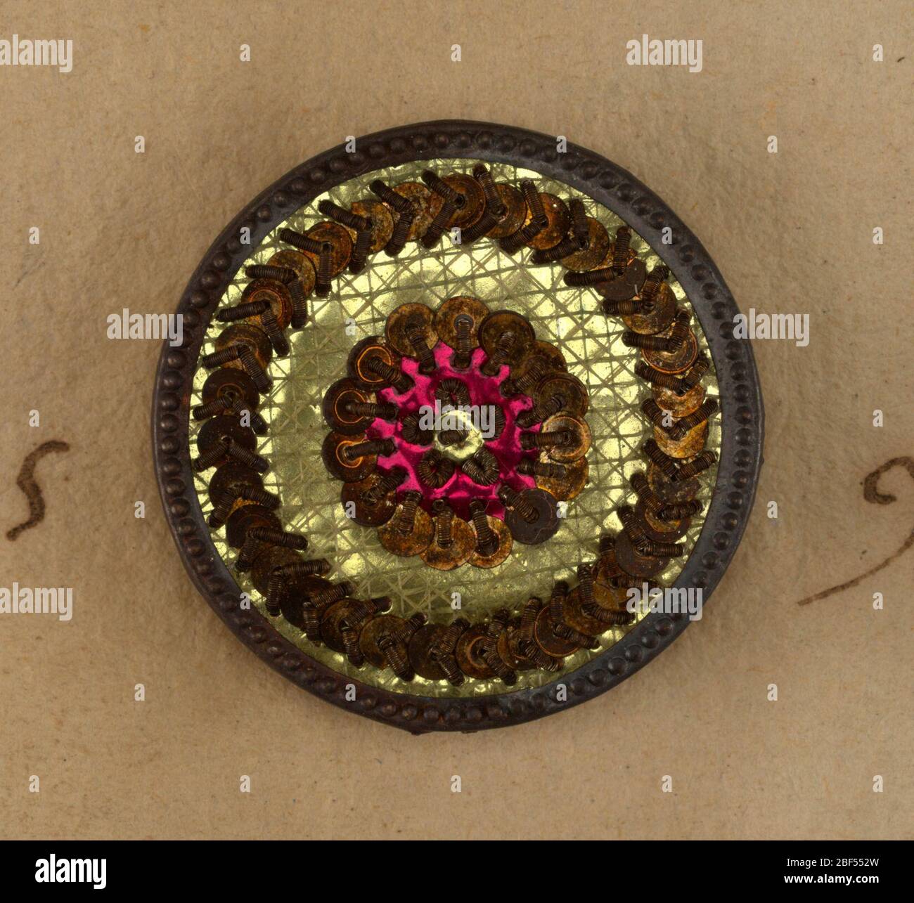 Button. Folding envelope of paper with tie closure; used as a case for ...