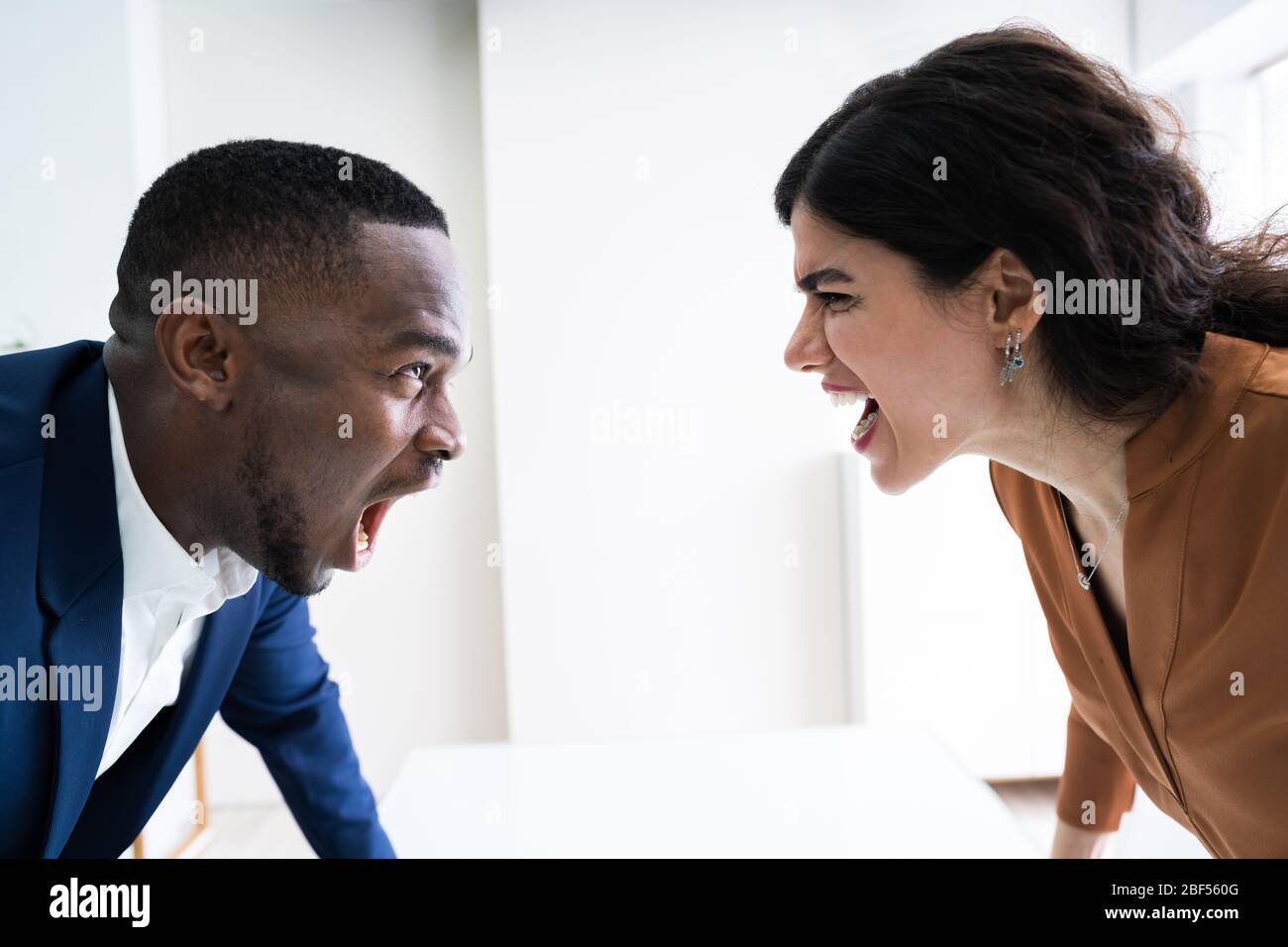 Shouting at each other hi-res stock photography and images - Alamy