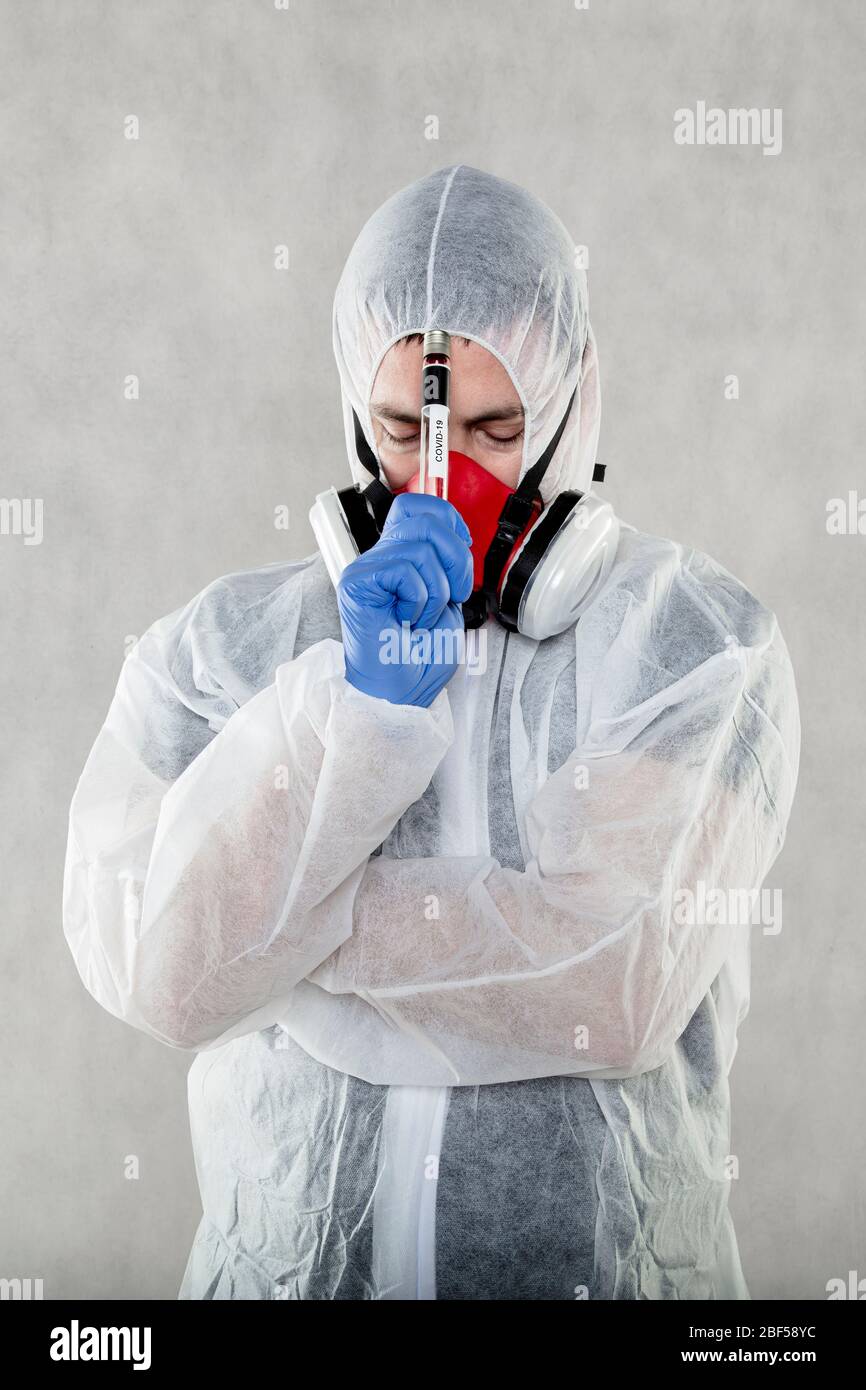 doctor in a complete protective suit Stock Photo - Alamy