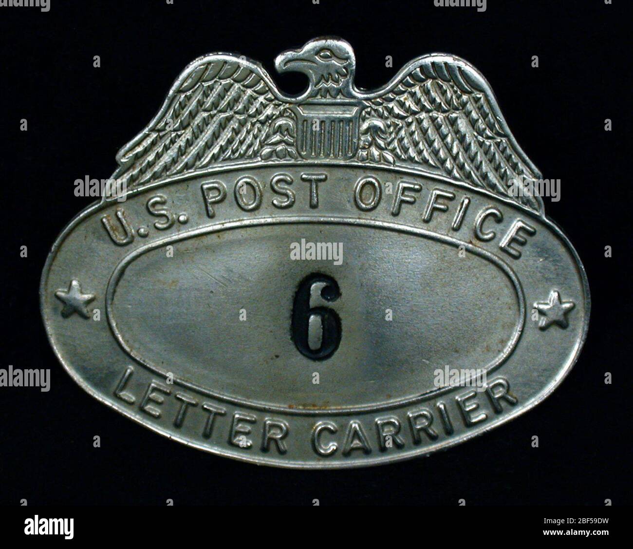 City letter carrier cap badge number 6. U. S. Post Office Department ...