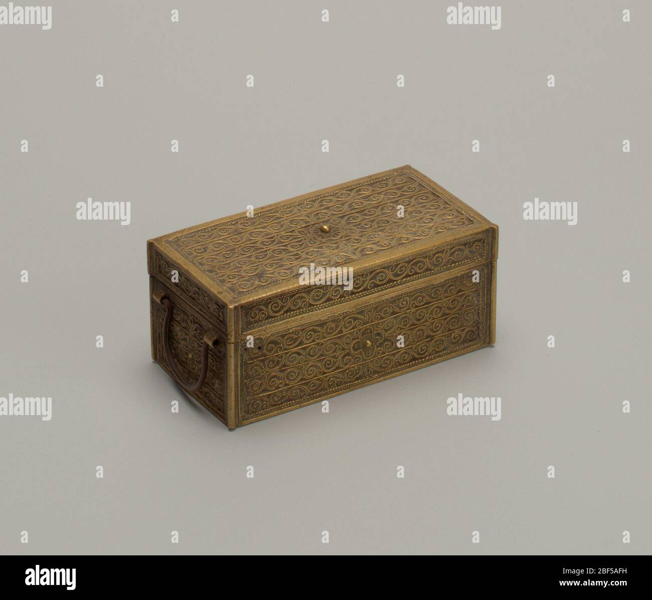 Inkwell stand. Rectangular box with round corner posts, horseshoe ...