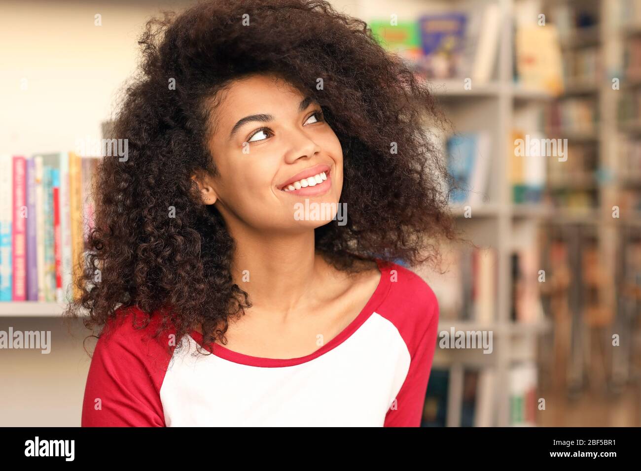 Portrait of African-American student in library Stock Photo - Alamy