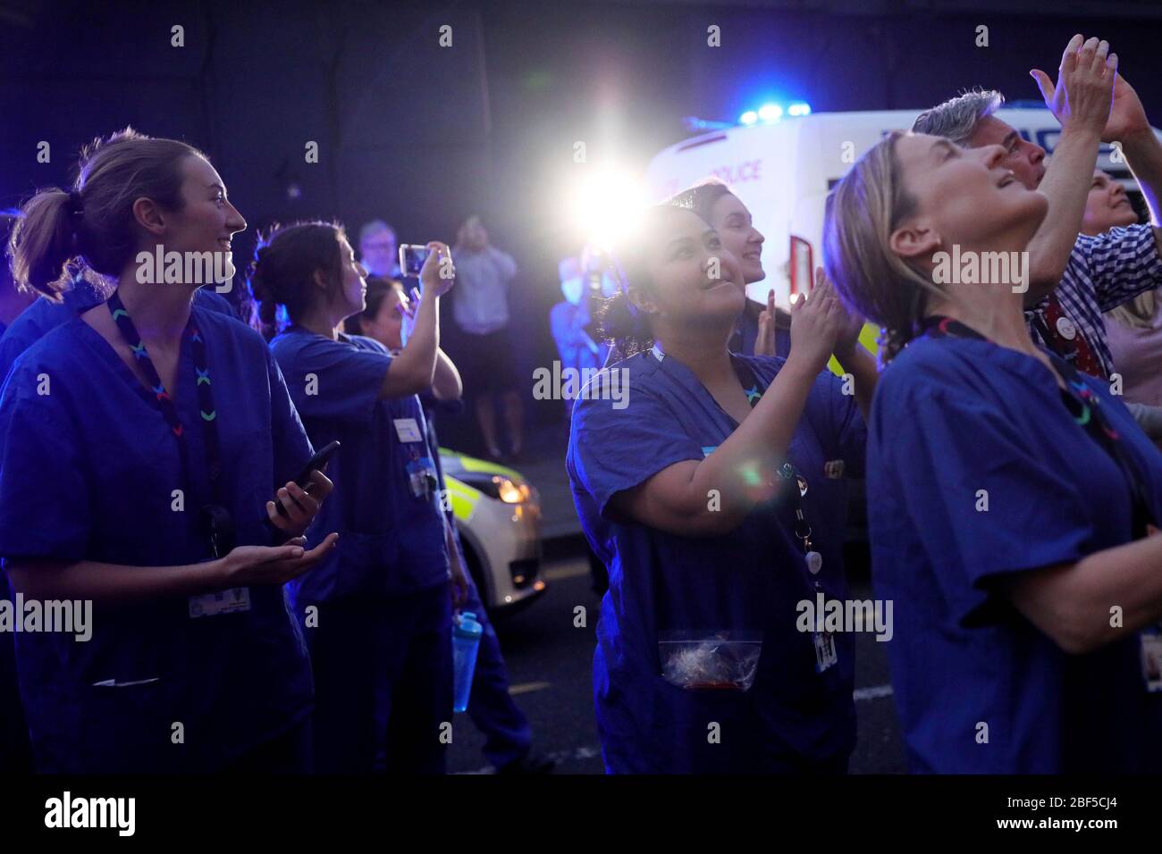 London, UK. 16th Apr, 2020. Medical workers applaud outside Chelsea and ...