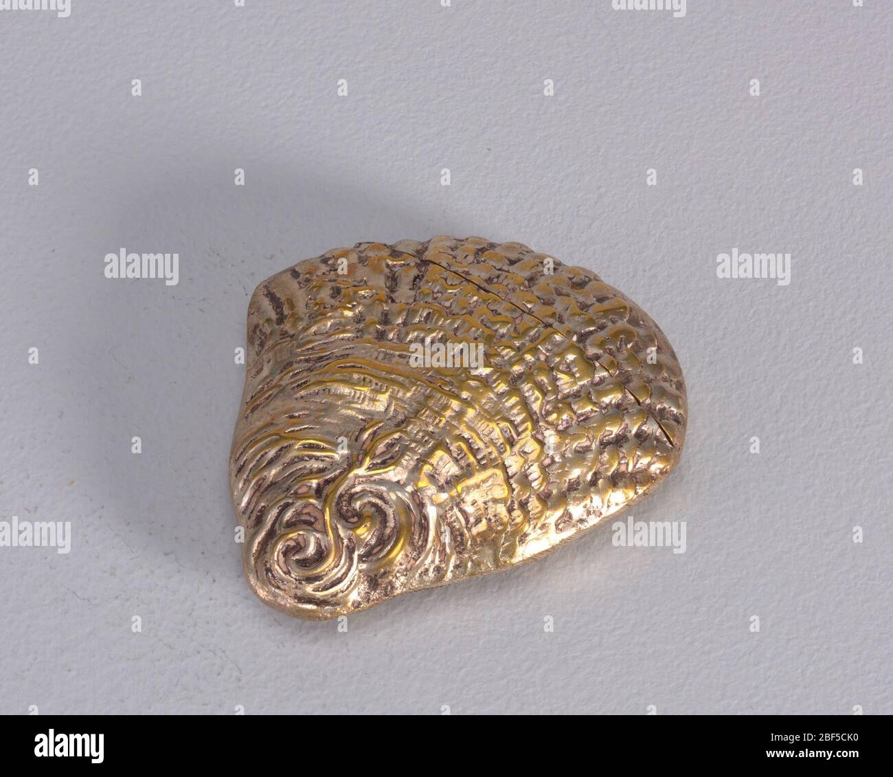 Oyster Shell. In the form of an oyster shell, with a cluster of seaweed ...