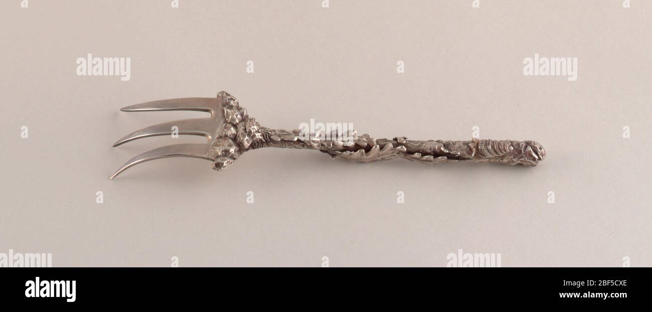 Fork. Trident shape, with marine algae and snail Stock Photo - Alamy