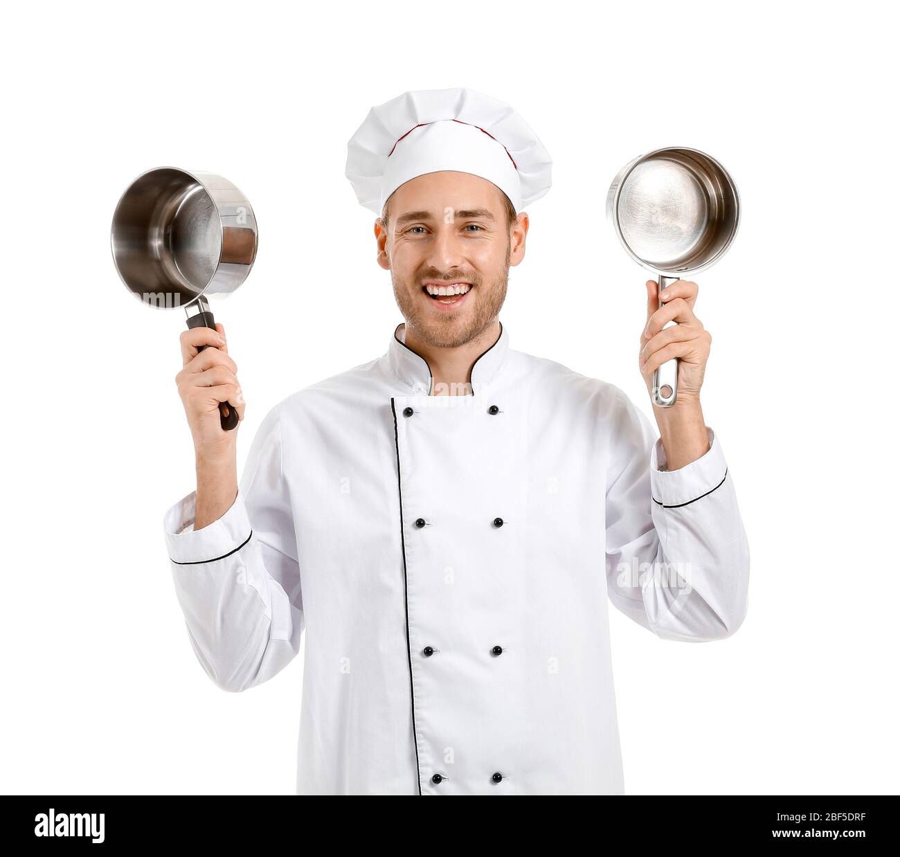 Handsome male chef with saucepans on white background Stock Photo - Alamy