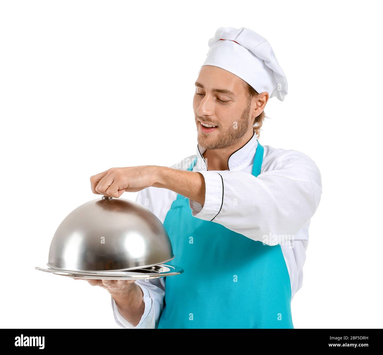 Handsome male chef with tray and cloche on white background Stock Photo ...