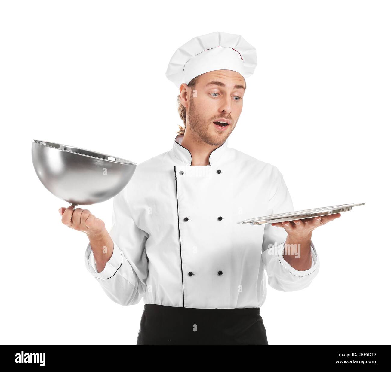 Shocked male chef with tray and cloche on white background Stock Photo ...