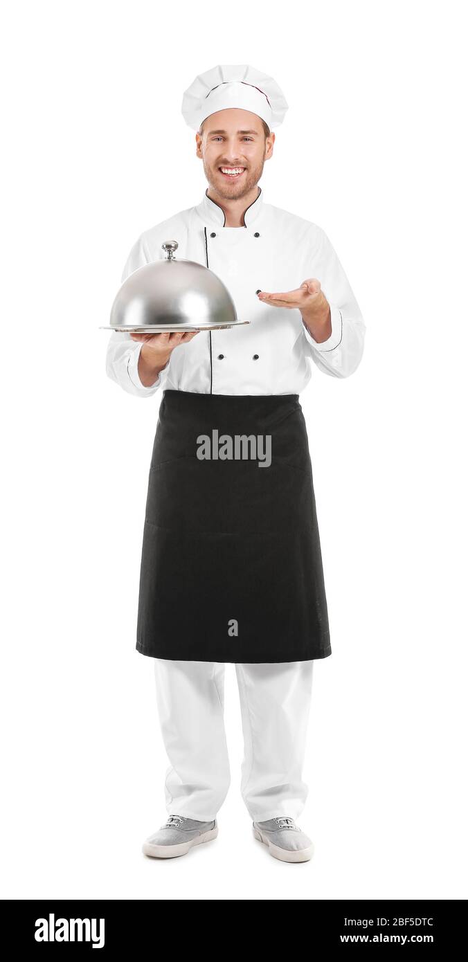 Handsome male chef with tray and cloche on white background Stock Photo ...