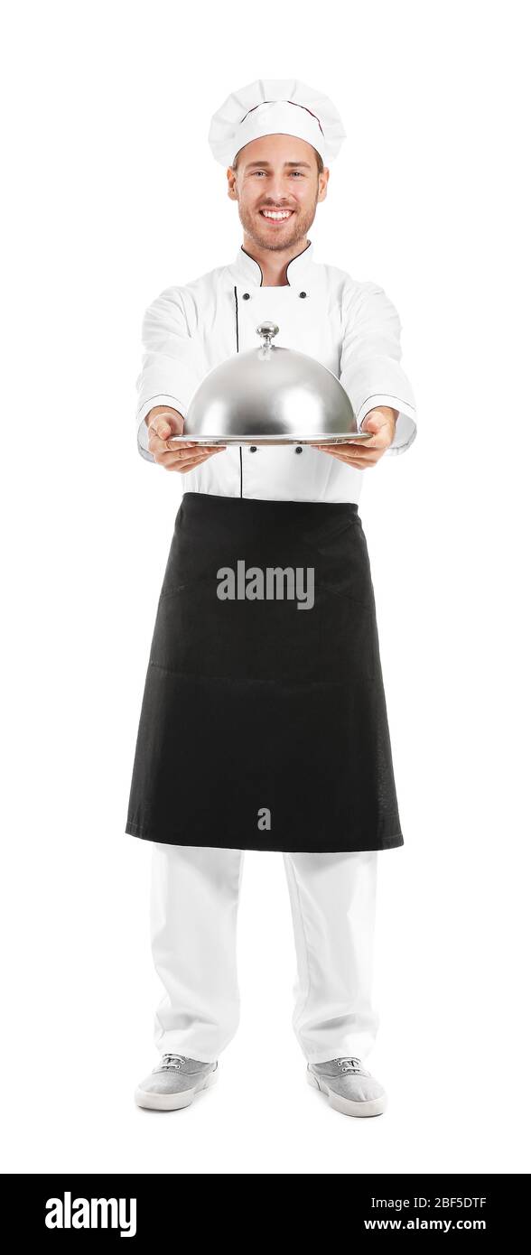 Handsome male chef with tray and cloche on white background Stock Photo ...