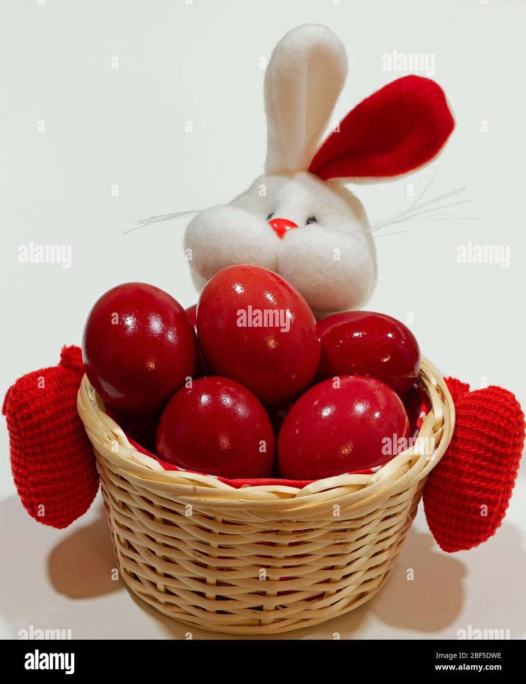 Easter bunny basket full of red eggs. Concept: easter celebration, Holy ...