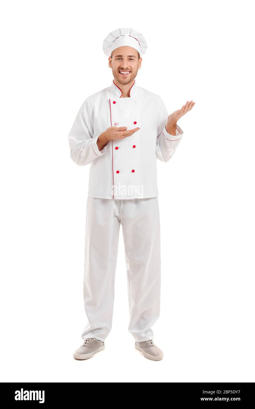 Handsome male chef showing something on white background Stock Photo ...