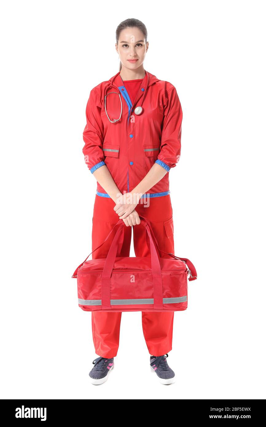 Female paramedic with bag on white background Stock Photo - Alamy