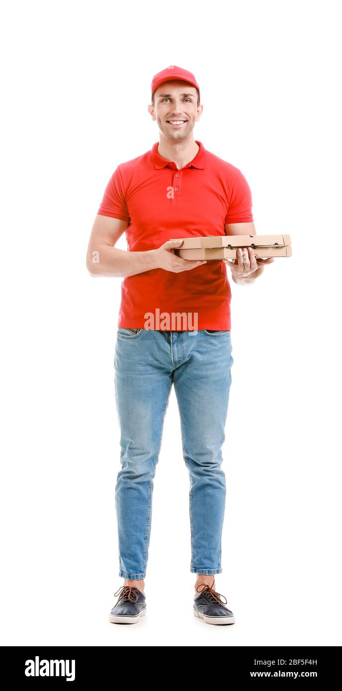 Handsome delivery man with pizza on white background Stock Photo - Alamy