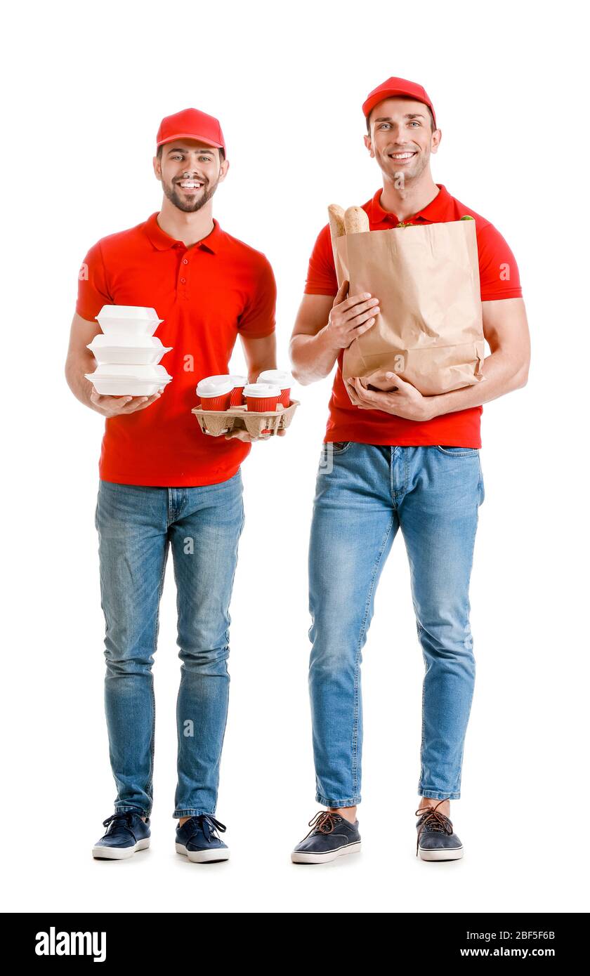Handsome workers of food delivery service on white background Stock ...