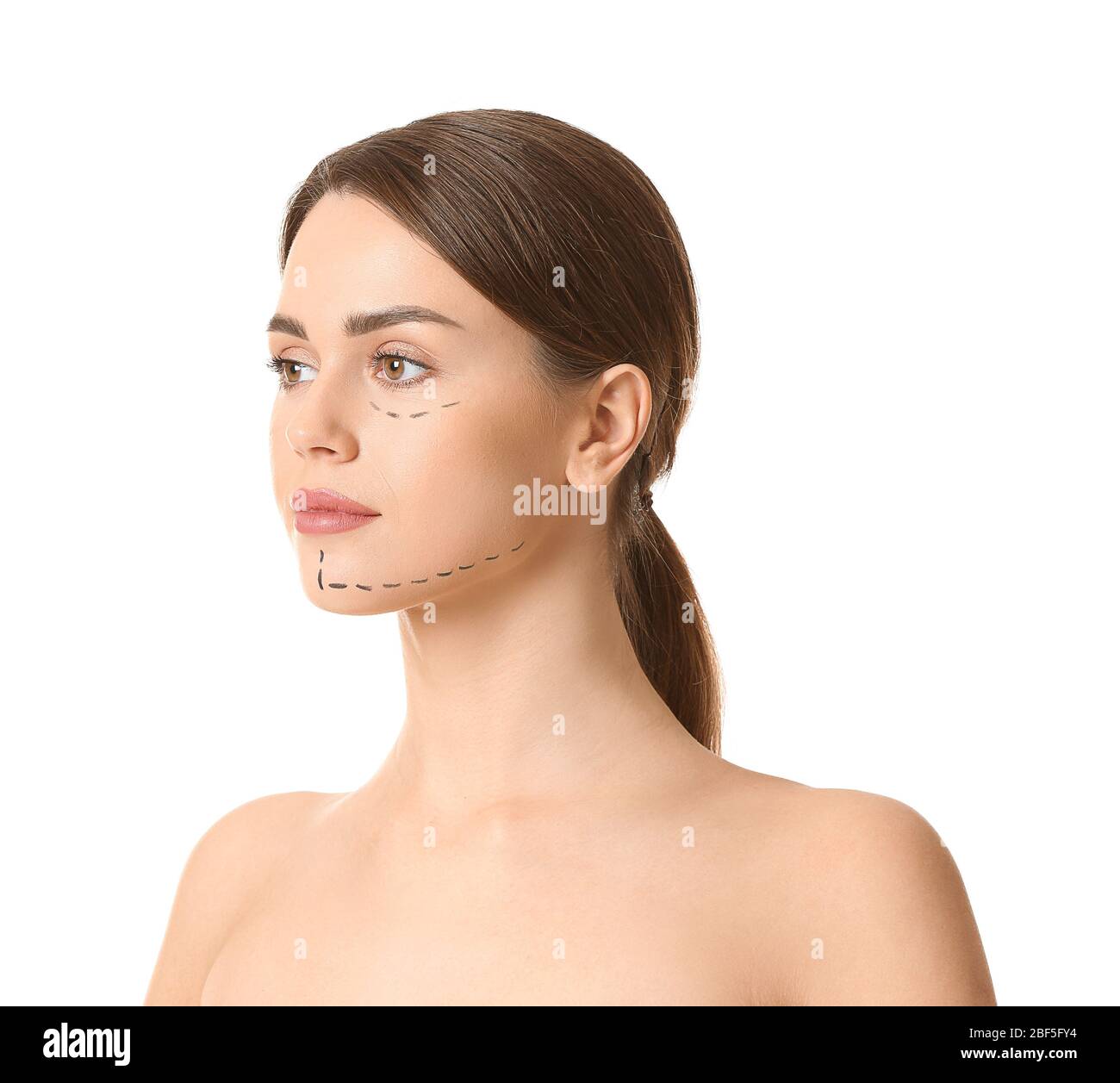 Young woman with marks on her face against white background. Concept of ...