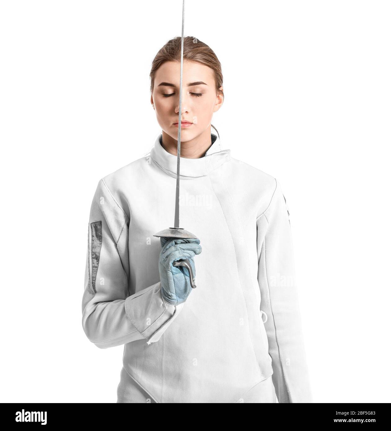 Young female fencer on white background Stock Photo - Alamy