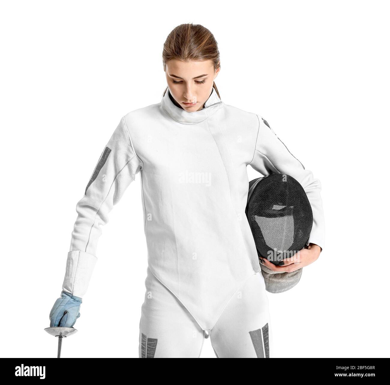 Young female fencer on white background Stock Photo - Alamy
