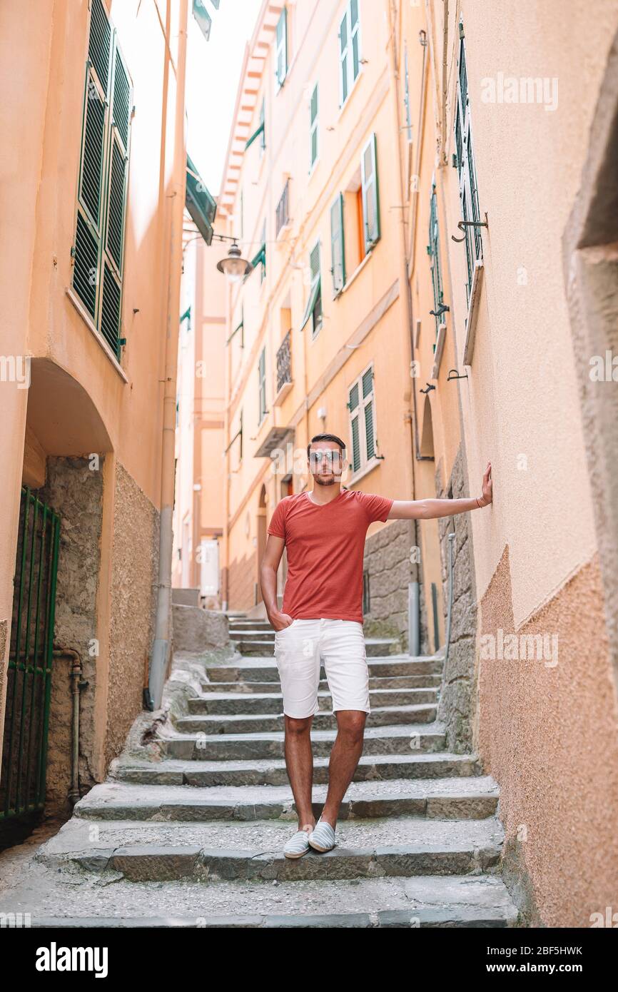 Man tourist outdoors in italian village on vacation Stock Photo - Alamy
