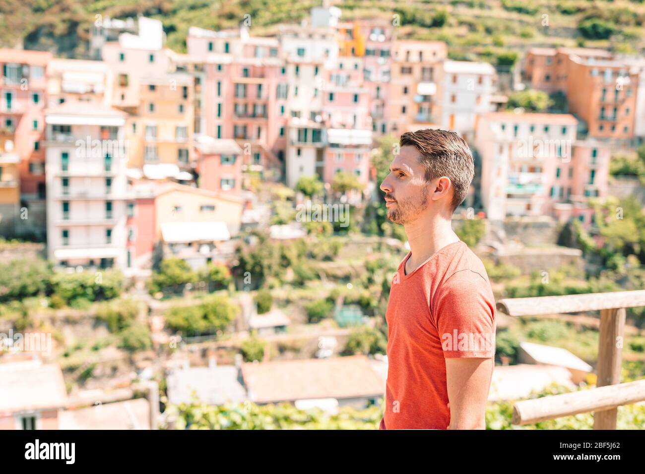 Man tourist outdoors in italian village on vacation Stock Photo - Alamy