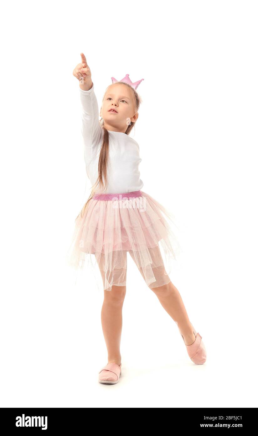 Cute little princess pointing at something on white background Stock ...