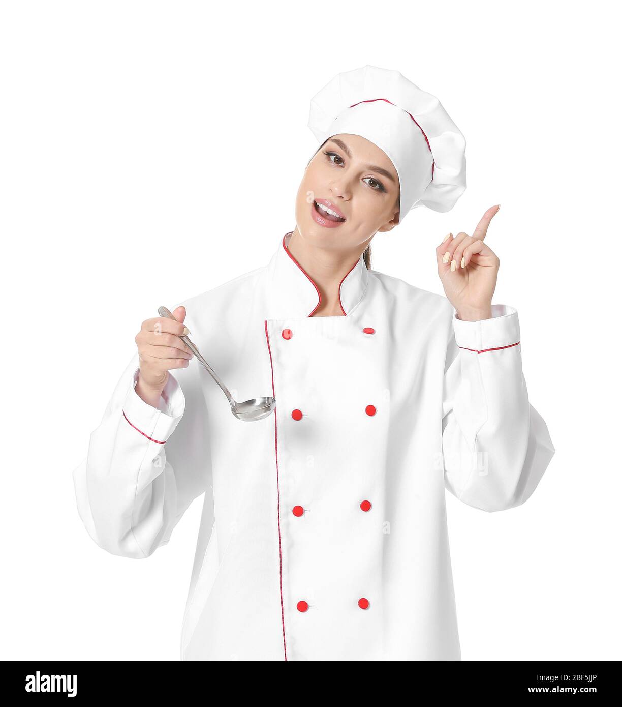 Beautiful female chef with raised index finger on white background ...