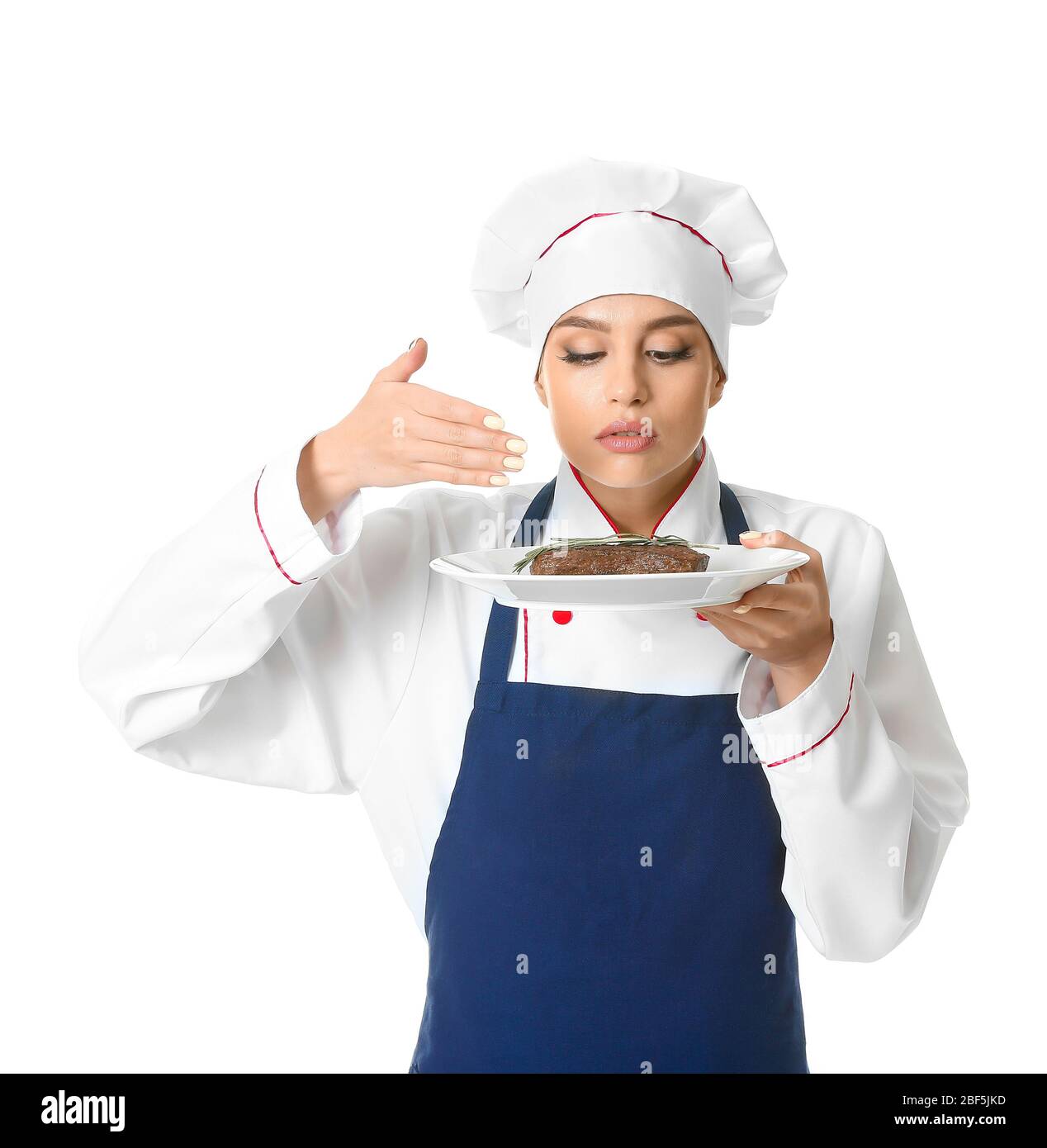 Beautiful female chef with tasty meat on white background Stock Photo ...