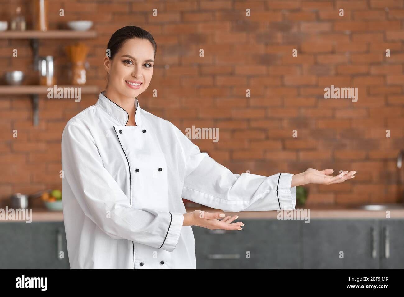 Beautiful female chef hi-res stock photography and images - Alamy