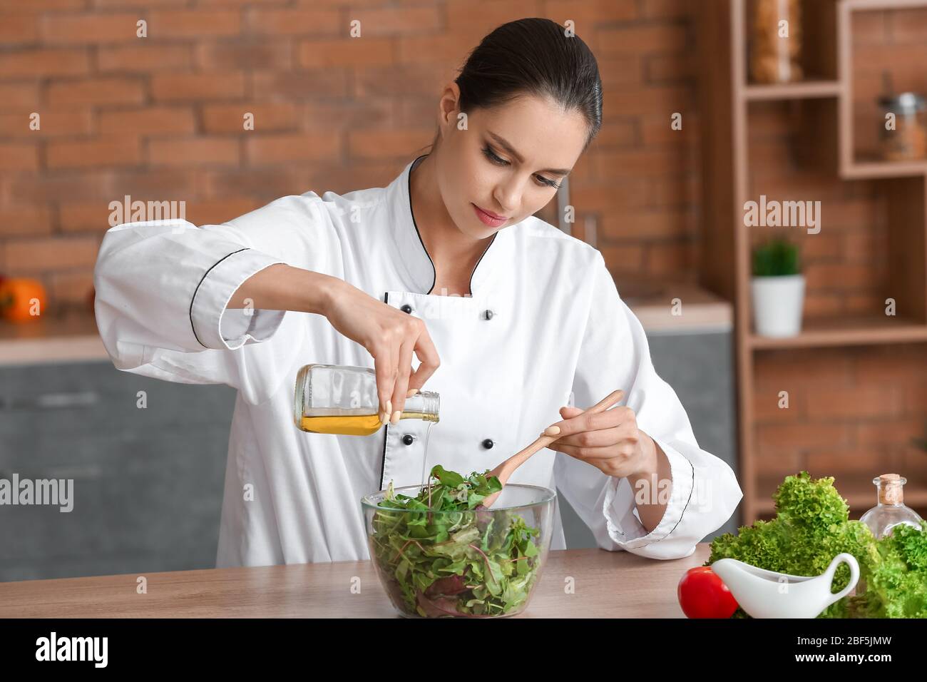 Female cook making restaurant menu hi-res stock photography and images ...