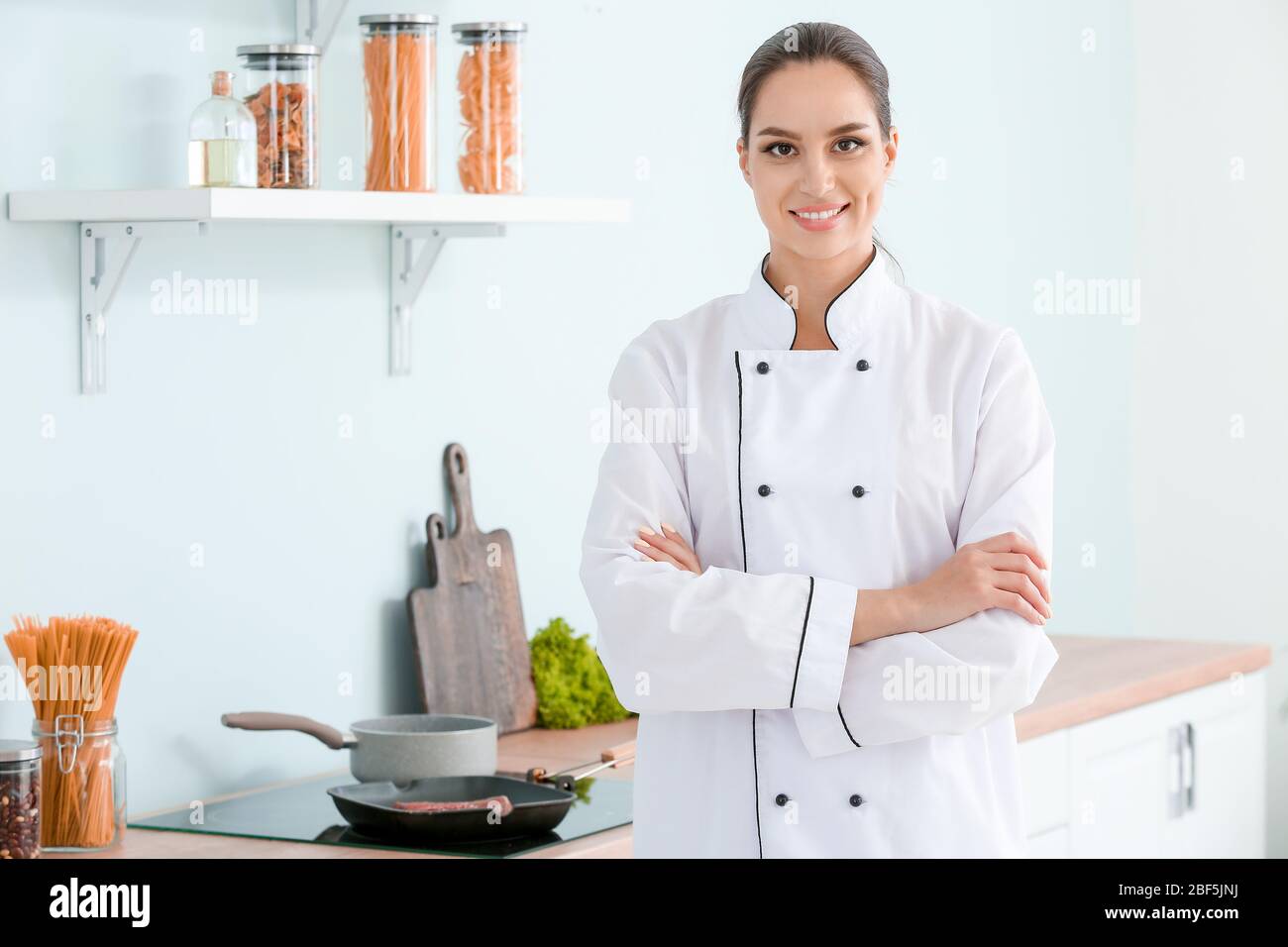 Beautiful female chef hi-res stock photography and images - Alamy