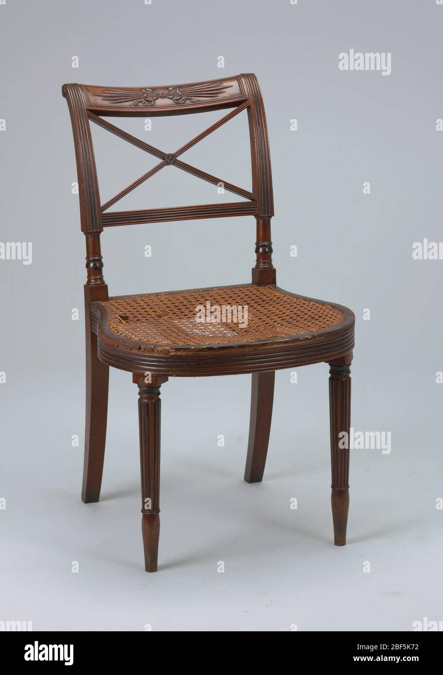 Side chair. Rounded and reeded seat rail; rounded and reeded tapering ...