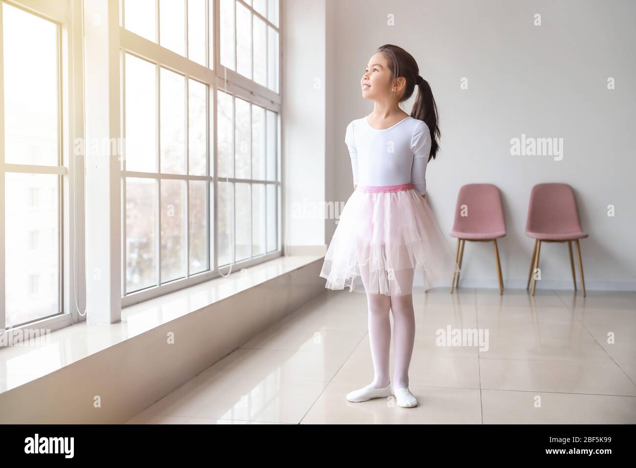 Little ballerina in dance studio Stock Photo - Alamy