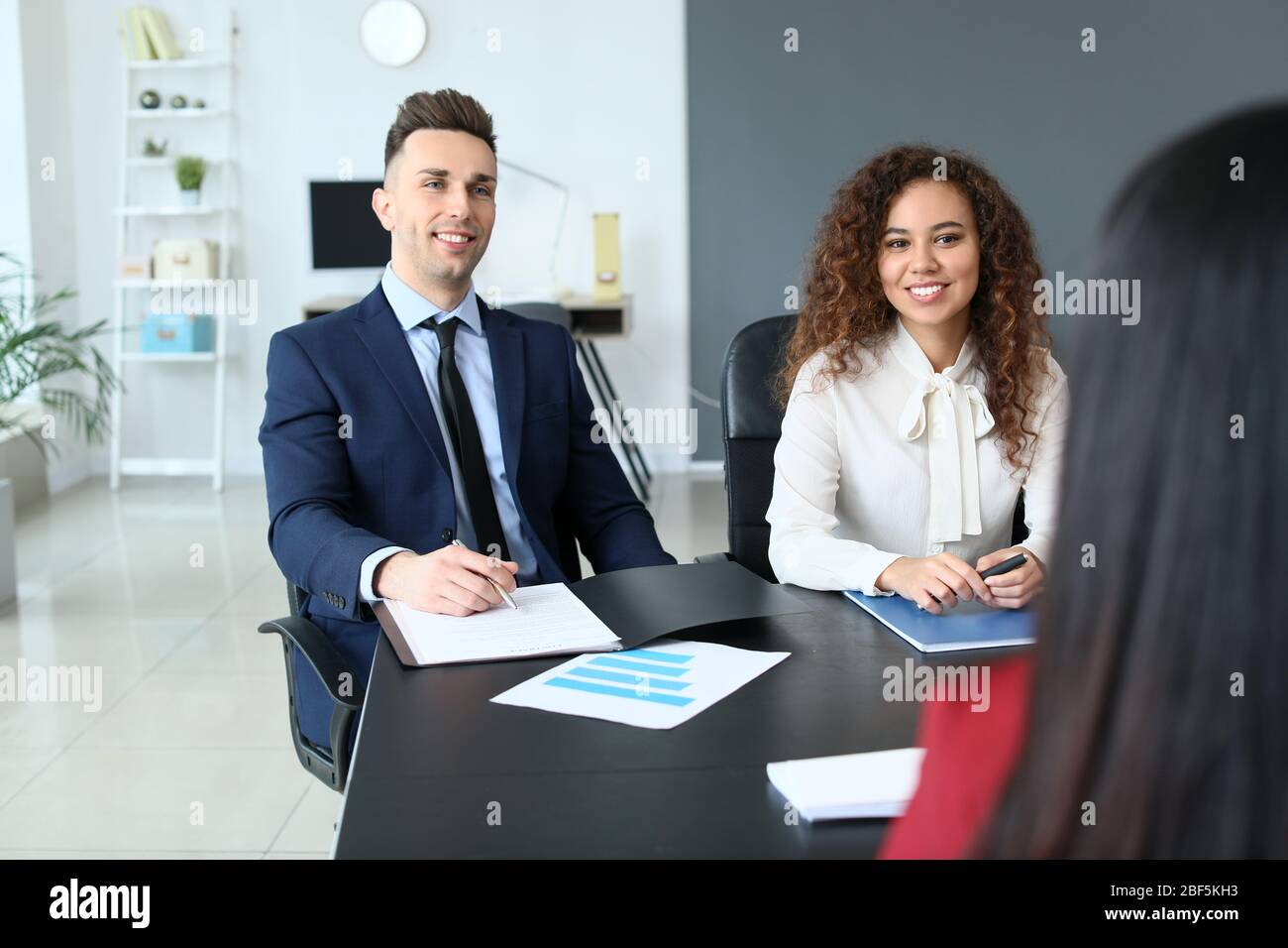 Man interviewing african woman hi-res stock photography and images - Alamy